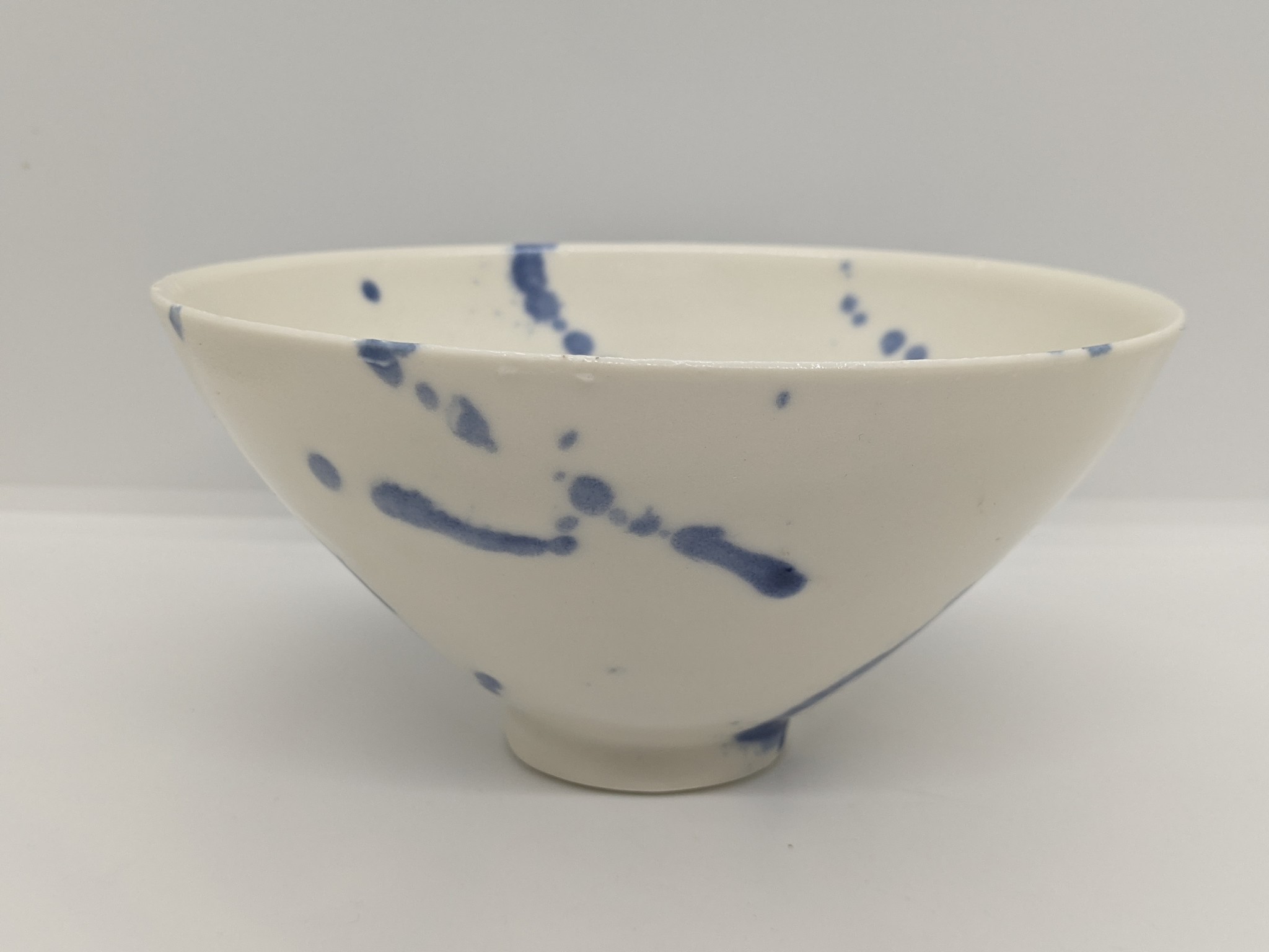 Porcelain splatter bowl by Anne Richards